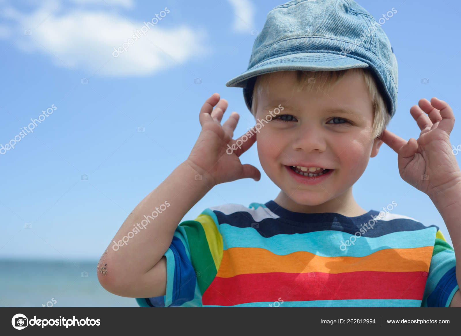 Portrait Small Boy Holds His Hands Ears Hear — Stock Photo © YAYImages ...