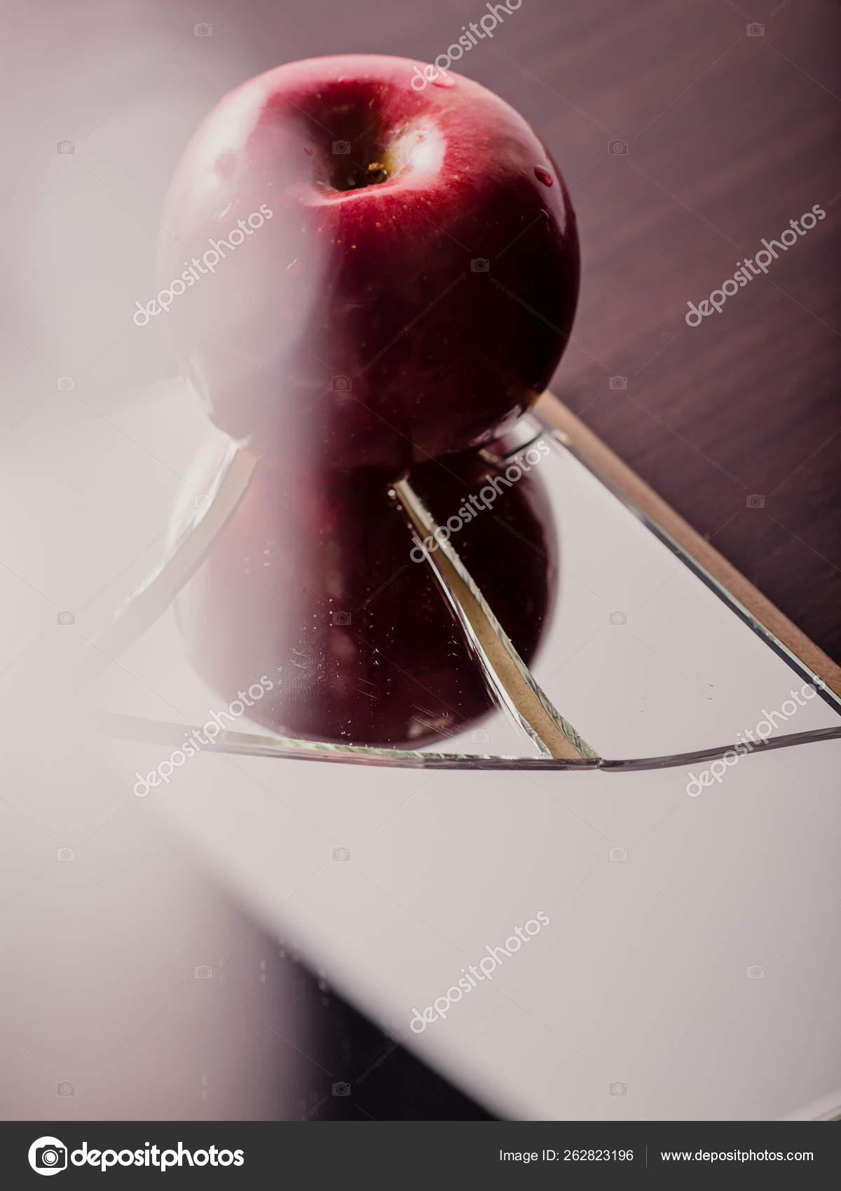 Red Apple Cracked Broken Mirror Reflecting — Stock Photo © YAYImages ...