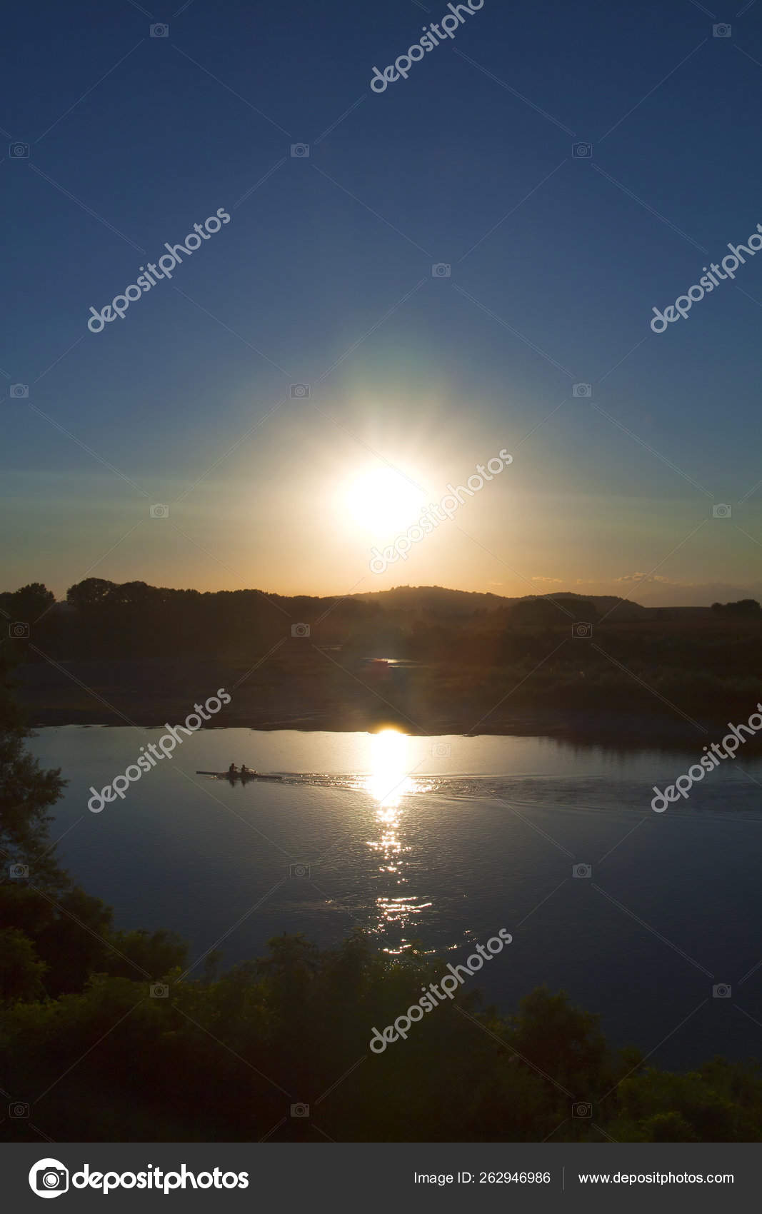 Silhouette Rowing Boat Sunshine Sunset Stock Photo by ©YAYImages 262946986