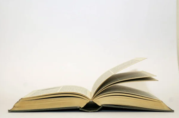 Open Book White Background Stock Photo by ©YAYImages 261768754
