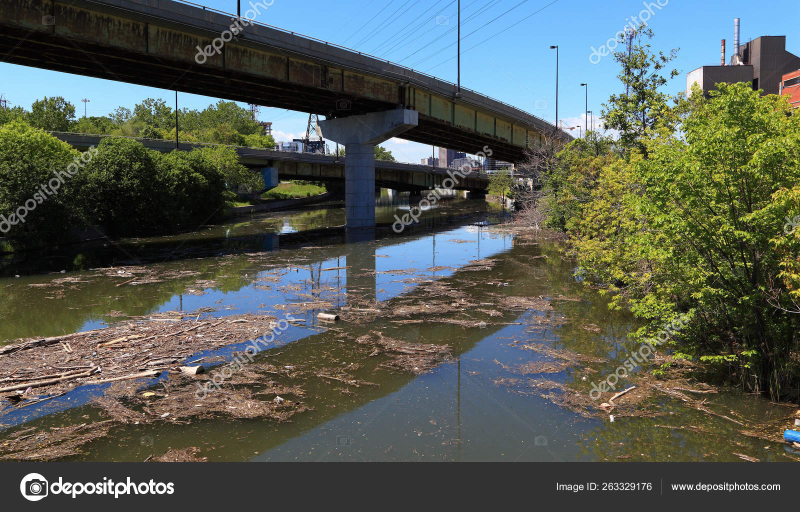 Garbage Debris Pollute Waterway Overpass Stock Photo by ©YAYImages ...