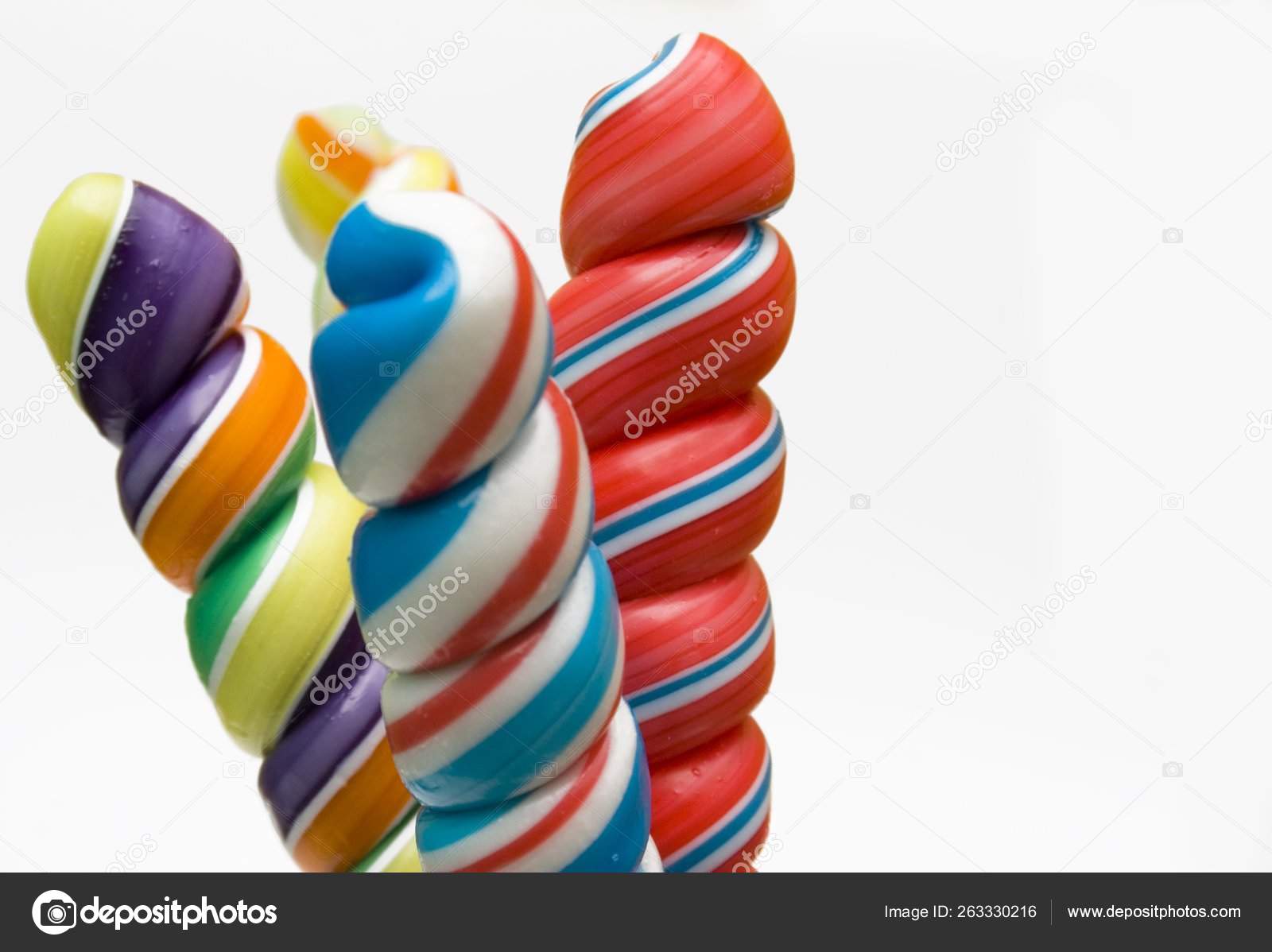 Twisted Brightly Colored Candies Stick White Background Stock Photo by ...
