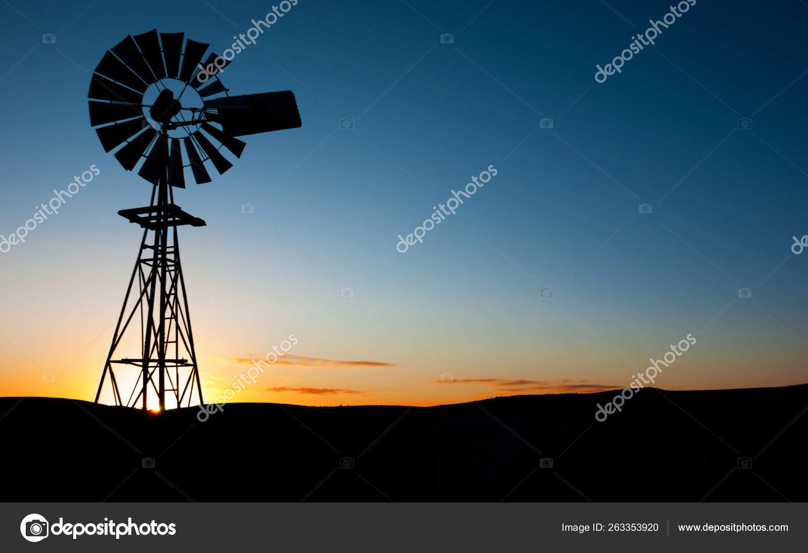 Sun Rises Windmill Stock Photo by ©YAYImages 263353920