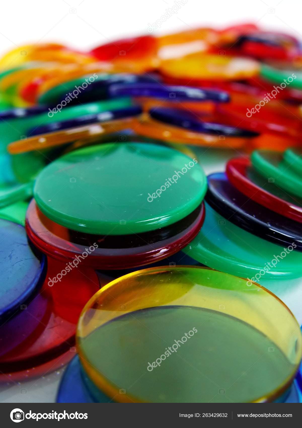Colored Plastic Counters Pile Stock Photo by ©YAYImages 263429632