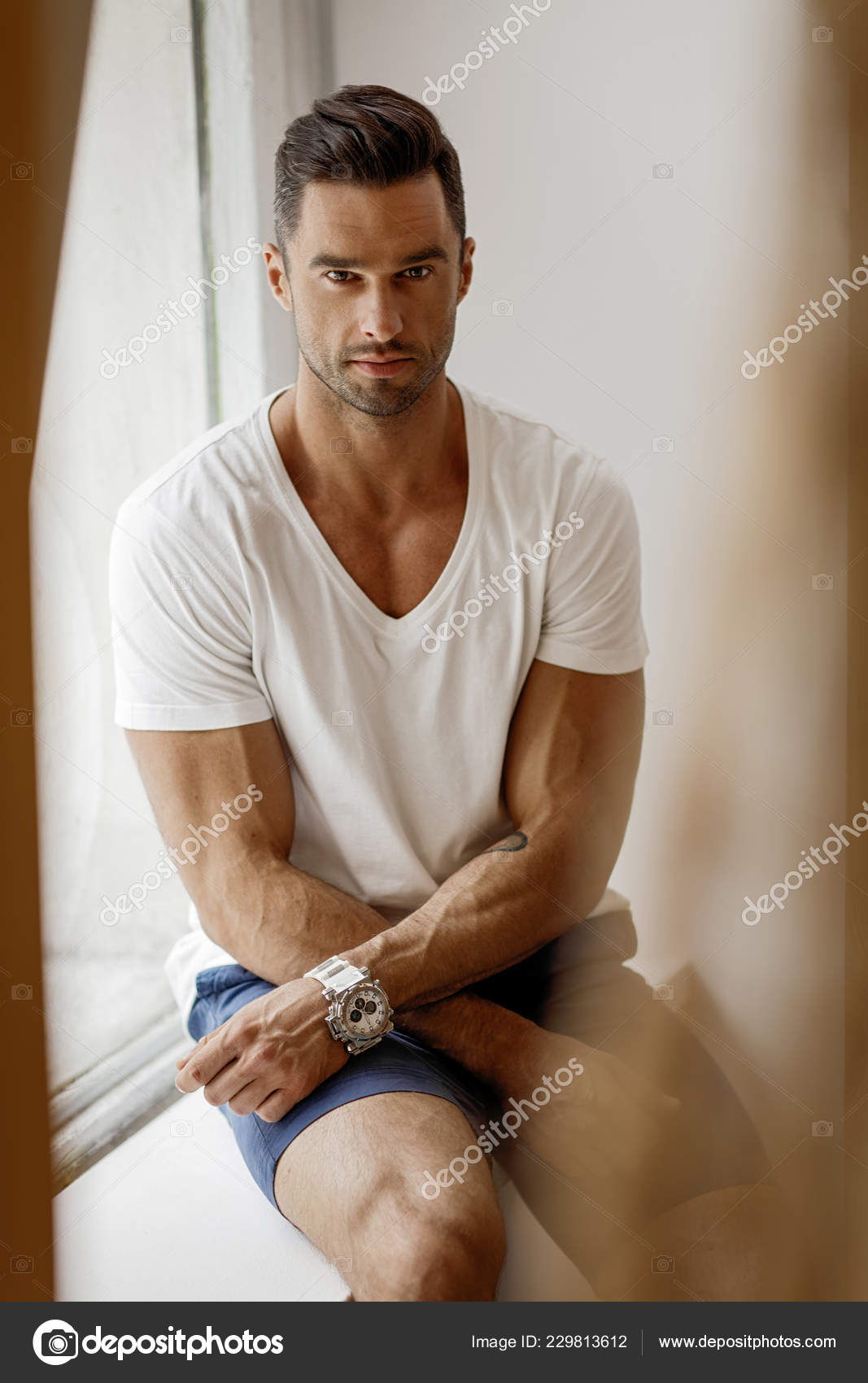 Healthy Handsome Man Sitting Looking Camera Stock Photo by ©kiuikson ...