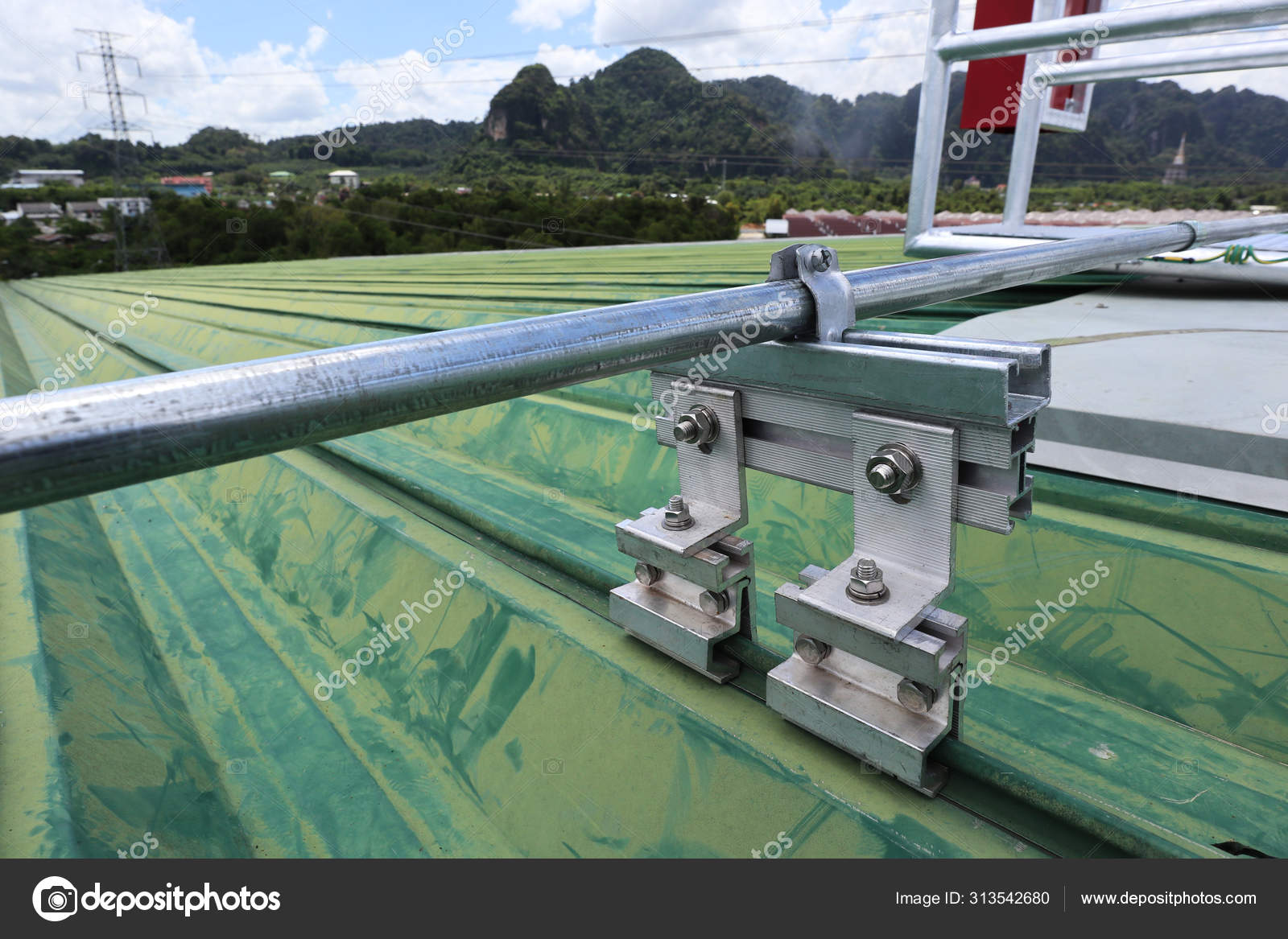 Electrical Conduit with Clamp Installation on Metal Sheet Roof — Stock ...