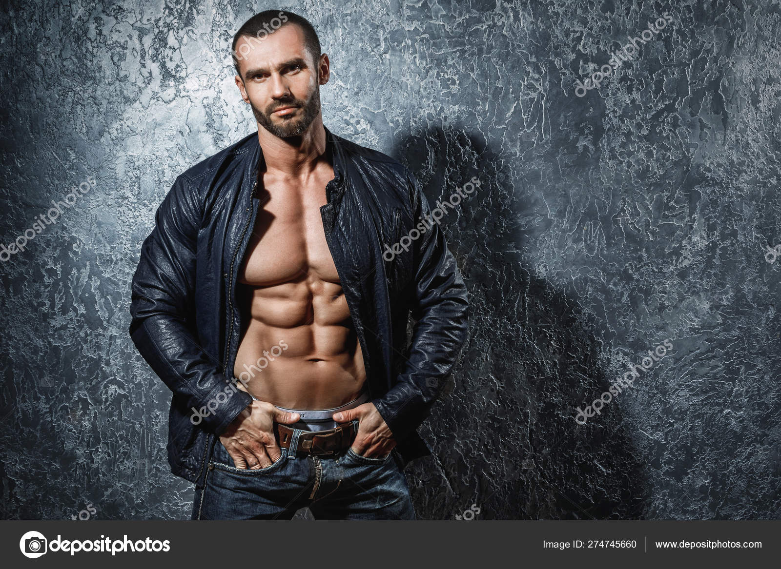 Handsome bodybuilder showing his muscular body — Stock Photo © AY_PHOTO ...
