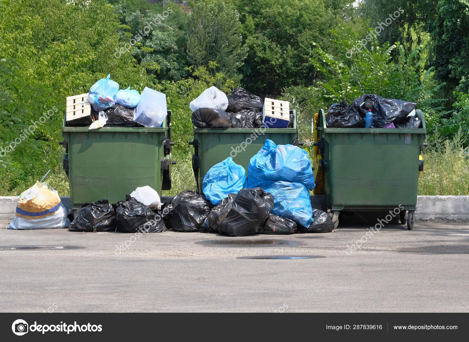 Dumpsters being full with garbage. Garbage is pile lots dump. Garbage ...