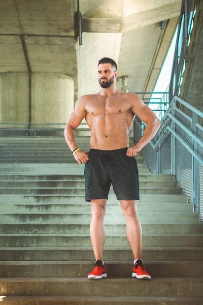 Young Athletic Build Man Standing Stairs — Stock Photo © IgorSinkov ...