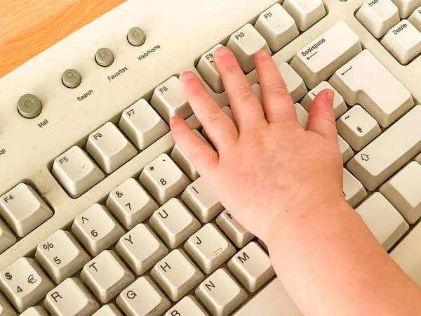 Child hand keyboard Stock Photos, Royalty Free Child hand keyboard ...