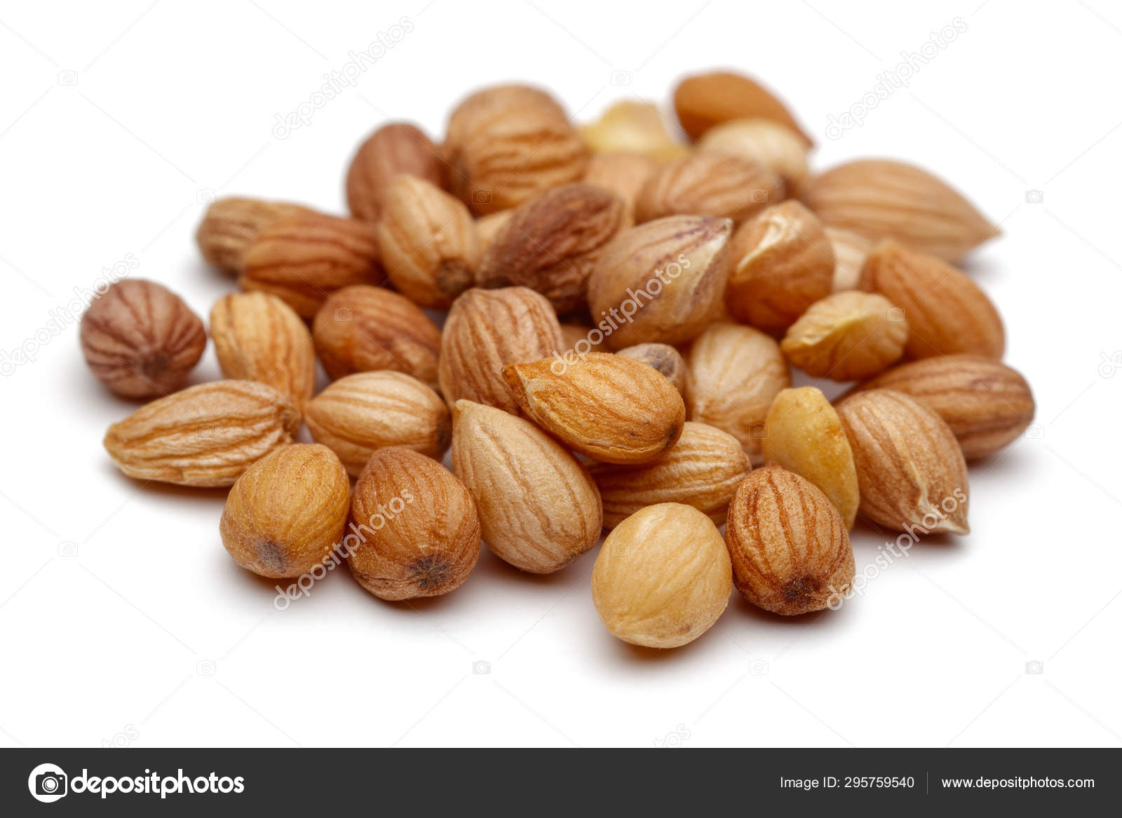Heap of mahlep or mahaleb seeds isolated Stock Photo by ©mahirart 295759540