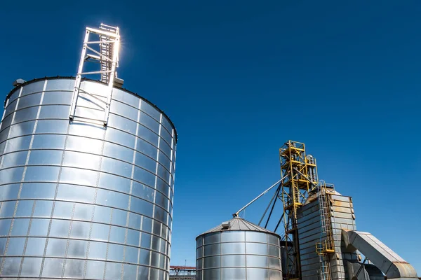 agro-processing plant for processing and silver silos for drying ...