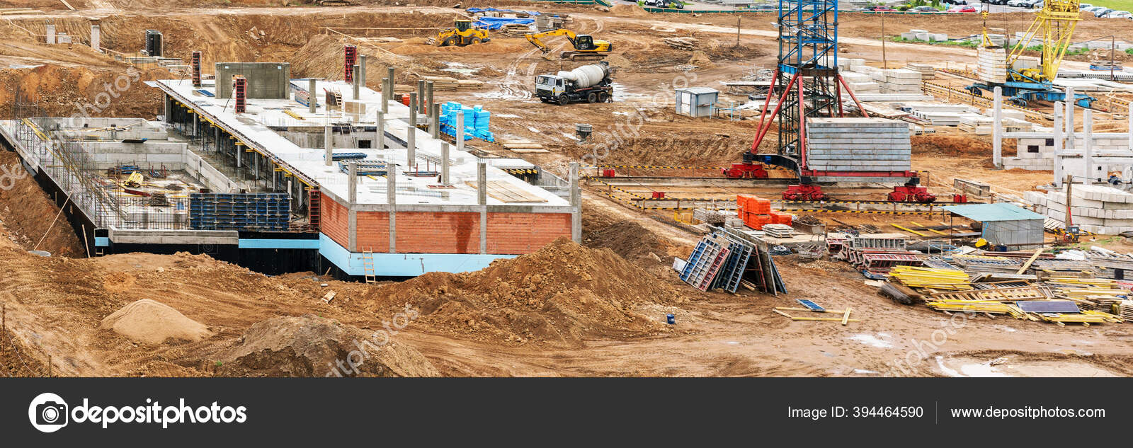 Building site with built first storey and machines on ground Stock ...