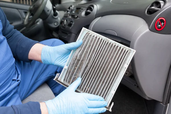 Replacing Old Car Cabin Air Filter — Stock Photo © macor #207910762 Replacing Old Car Cabin Air Filter — Stock Photo © macor #207910762
