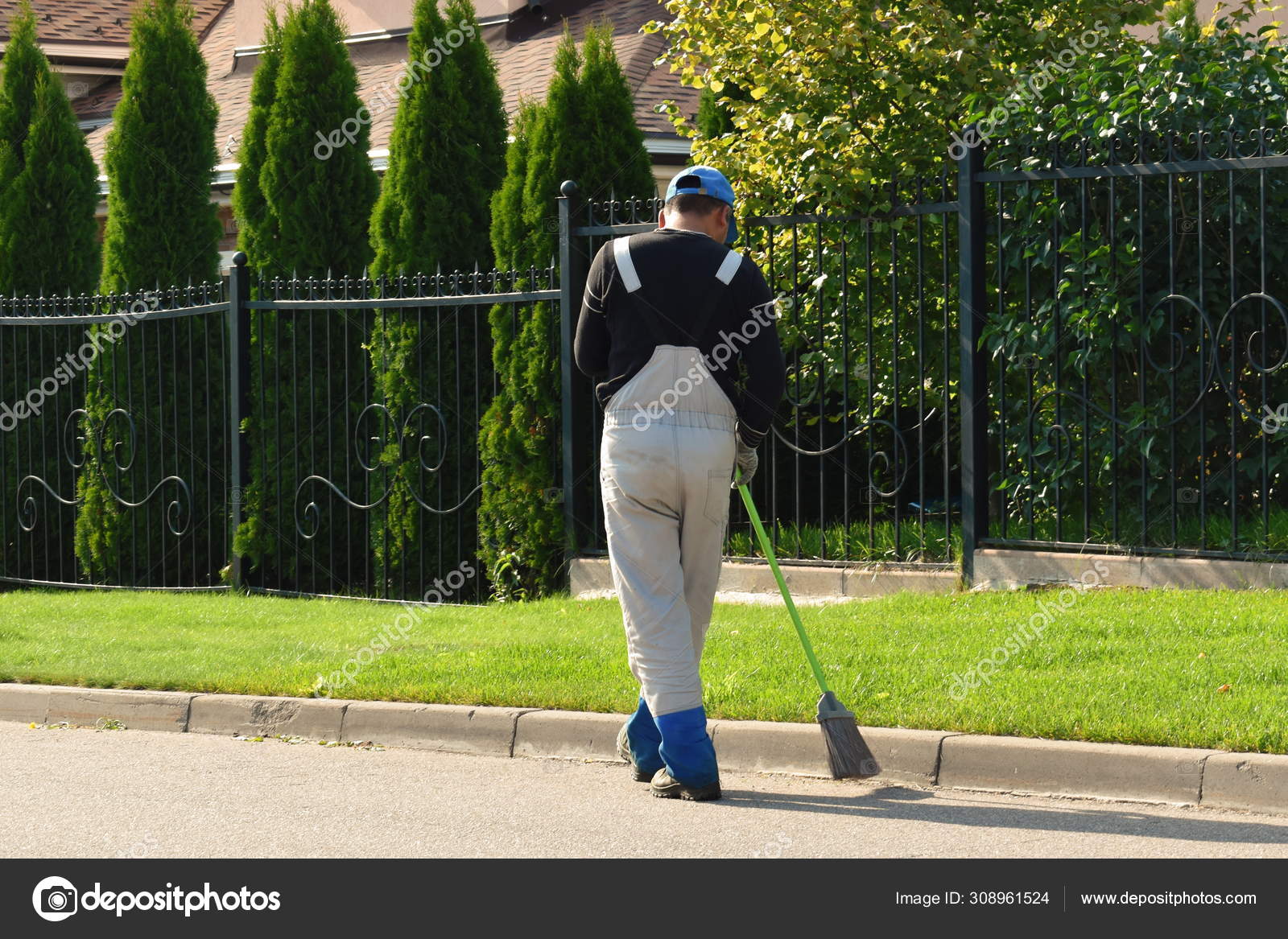 The hard work of the janitor. Cleaning the urban area. – Stock ...