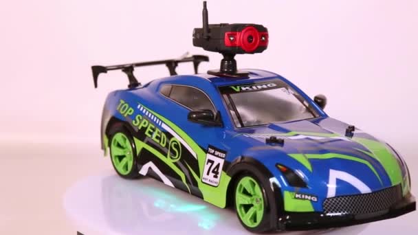 Sports car scale model car rotating against a white background. — Stock ...