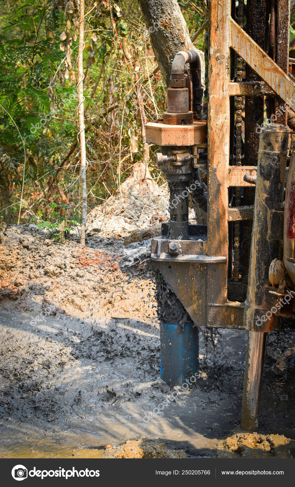 Digging hole drilling groundwater machine installed on deeps gro ...