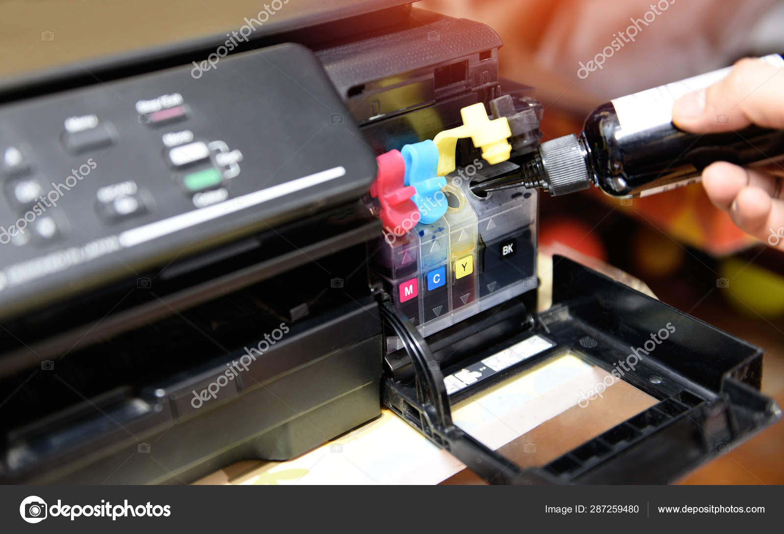Refill ink tank printer at office - Close up printer cartridge i ...