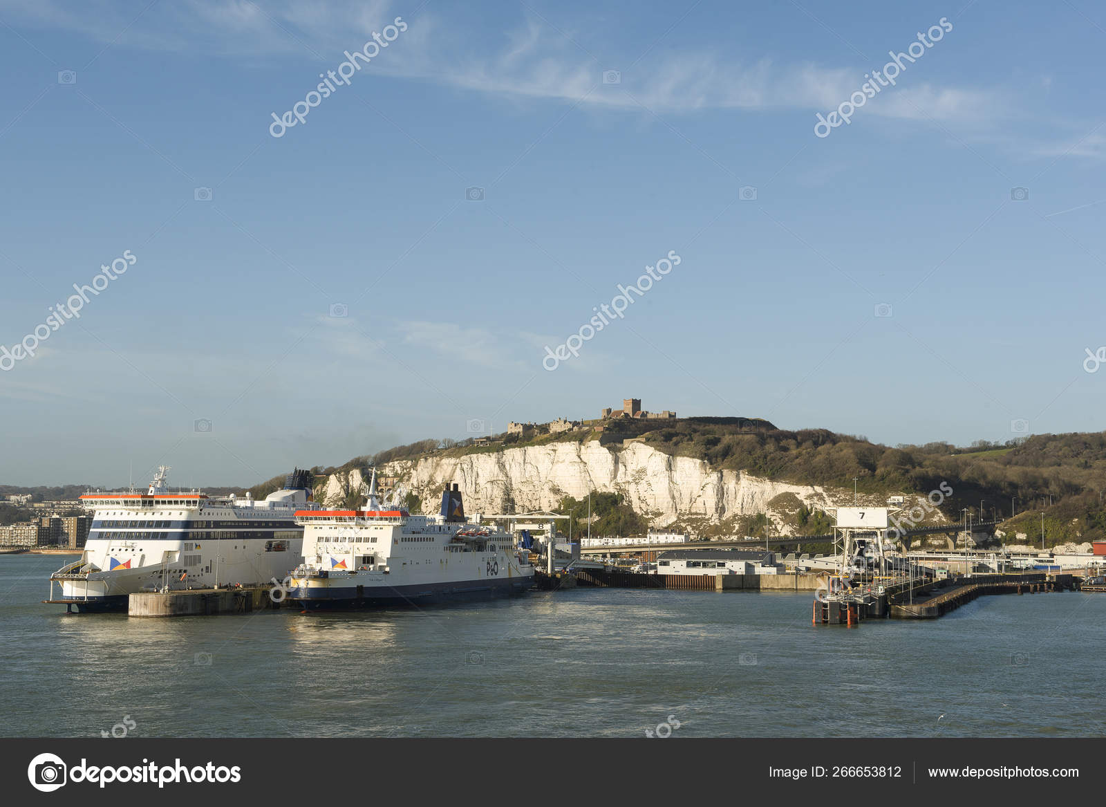 Port of Dover, with white cliffs and the Dover castle and two ferry ...
