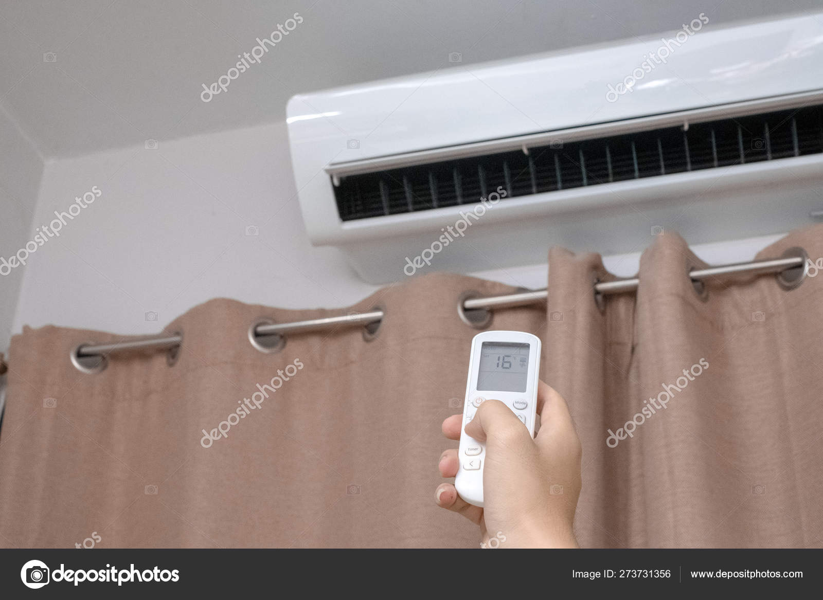 Focus ahead.Air condition control by using remote control and tu — Stock Photo ...