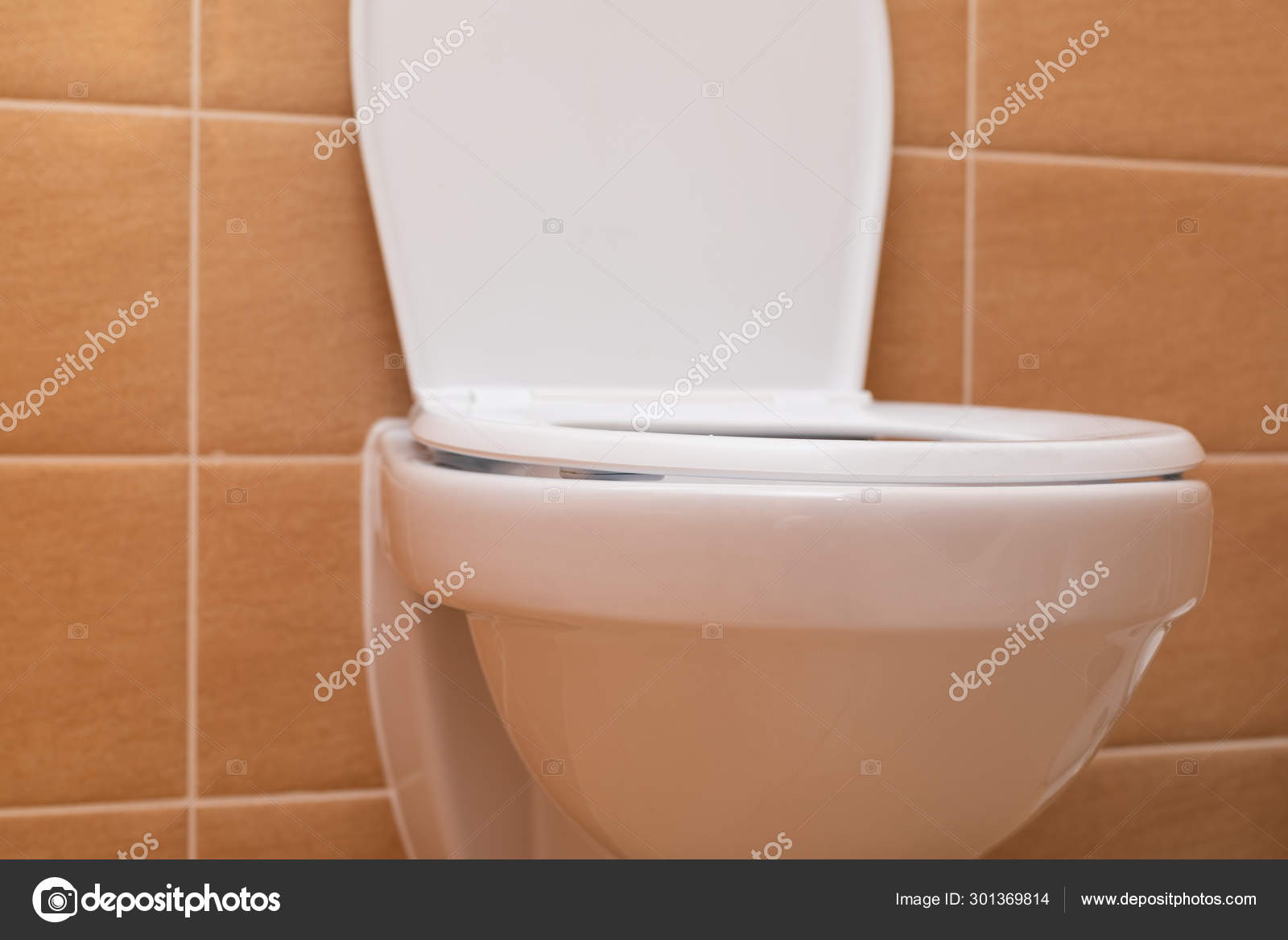 Toilet bowl at a bathroom — Stock Photo © ocskaymark #301369814