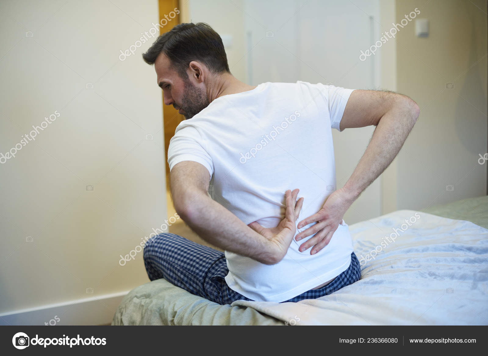 Rear View Man Suffering Backache — Stock Photo © gpointstudio #236366080