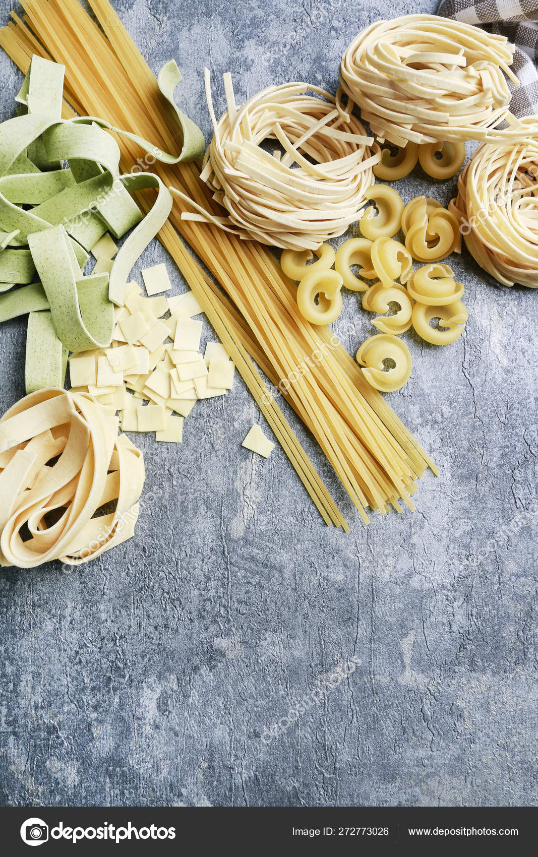 Mixed types and shapes of italian pasta on grey stone, backgroun Stock ...