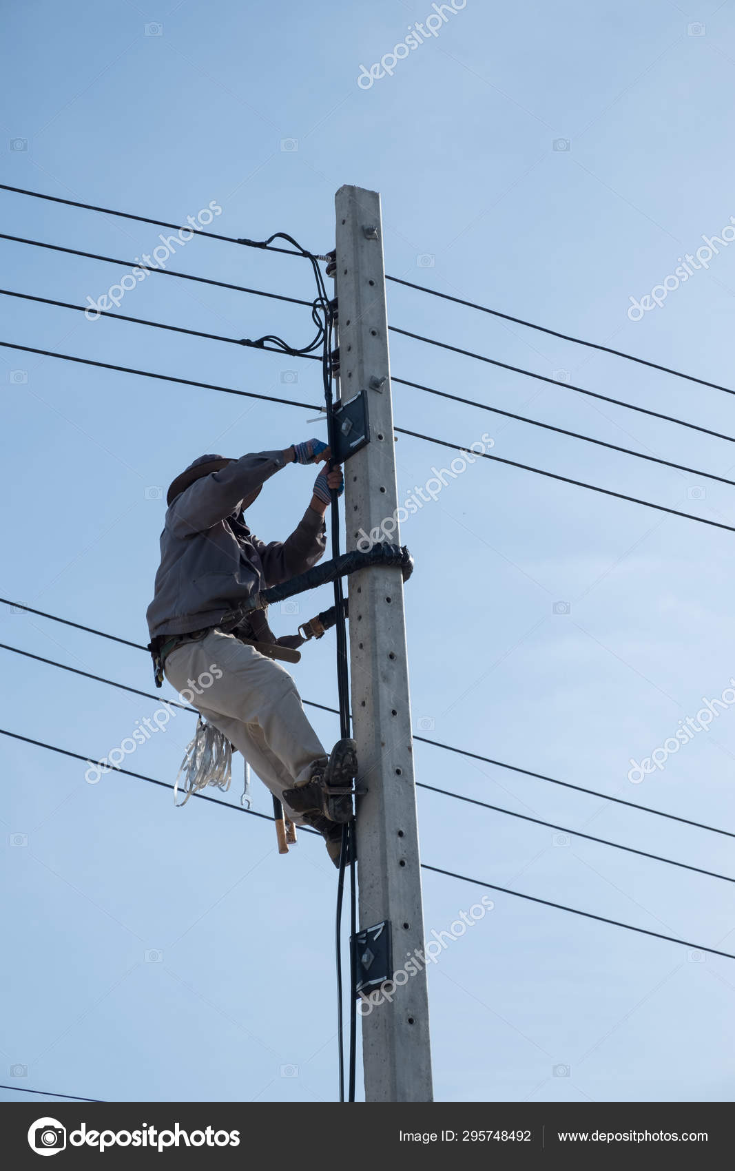Electricty Power Lines Man Climbing. — Stock Photo © nikonlike #295748492