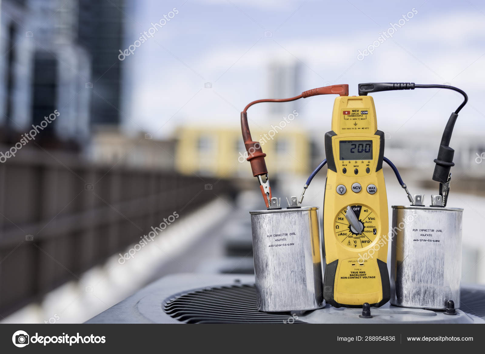 Multimeter and run capacitors on condenser Stock Photo by ©spatesphoto ...