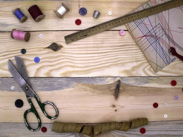 Materials and tools for sewing vintage, scissors, ruler, threads ...