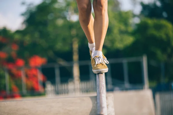 Legs walking on steel pipe with balance - Stock Image - Everypixel