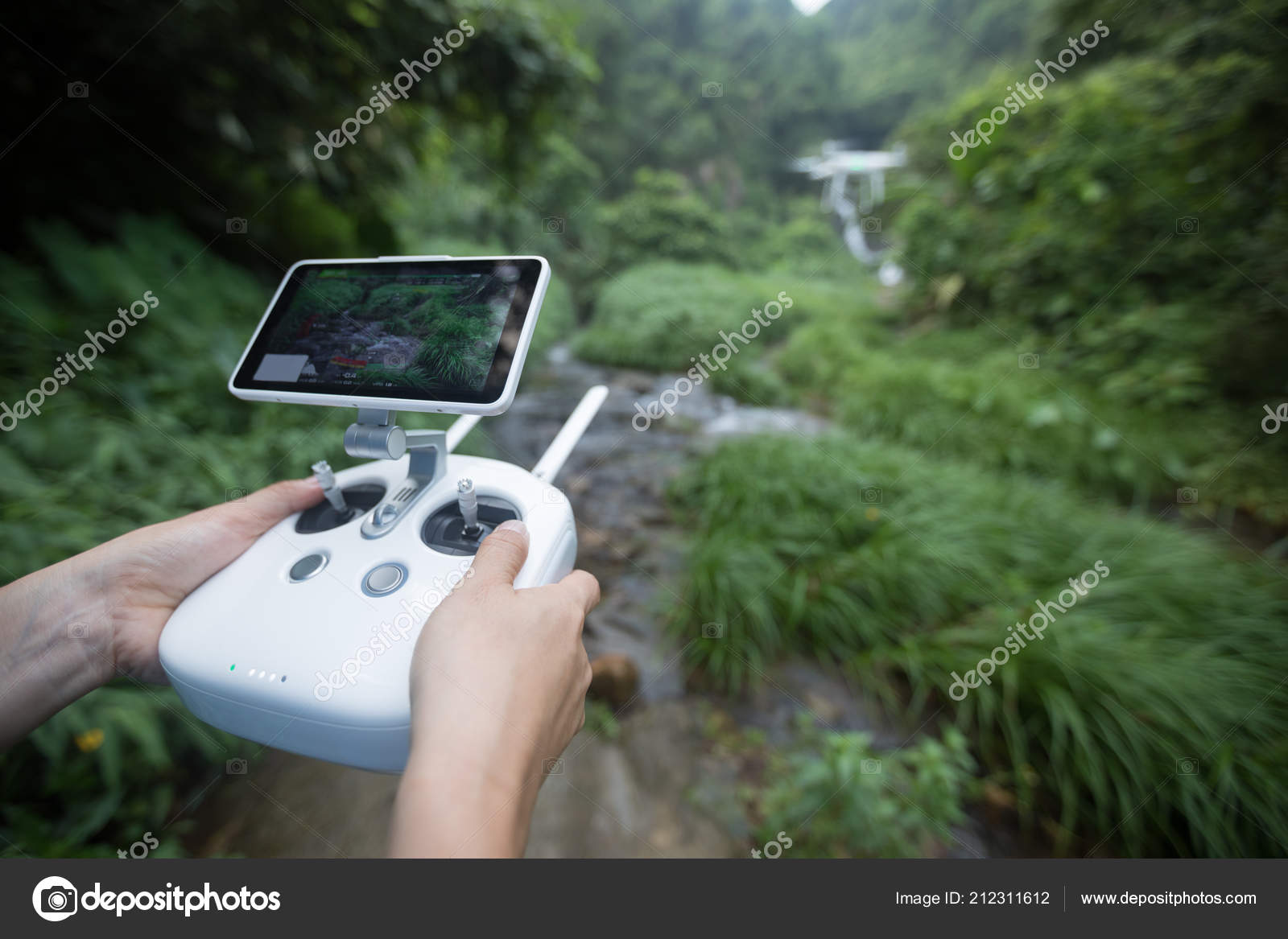 Woman Remote Controller Hands Controlling Drone — Stock Photo © lzf #212311612
