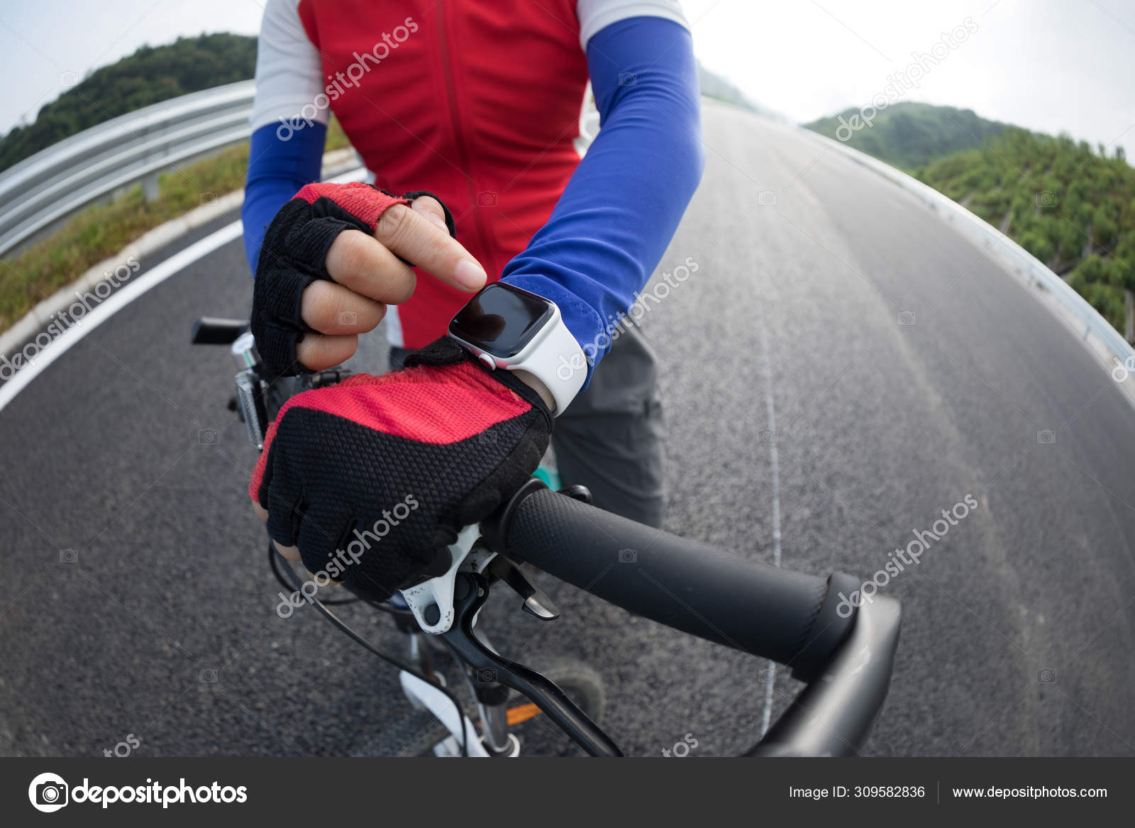 Woman Cyclist Set Smartwatch Riding Bike Highway — Stock Photo © lzf ...