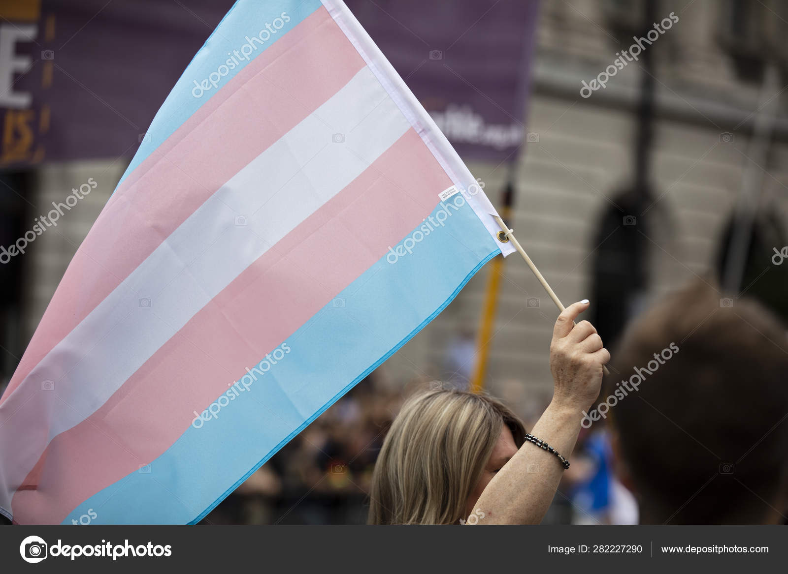 A transgender flag being waved at LGBT gay pride march — Stock Photo ...