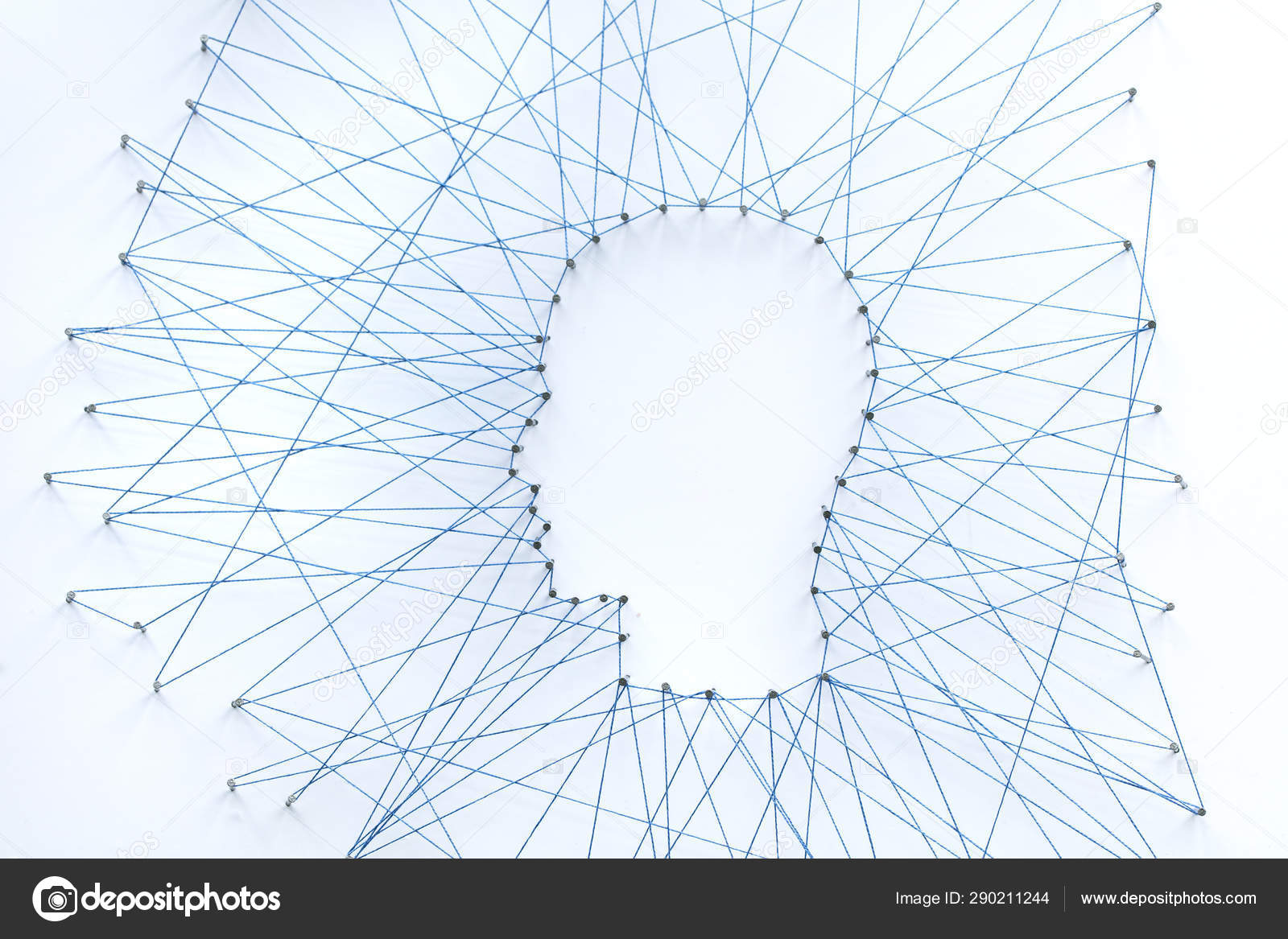 Human head shape made from a large grid of pins connected with s Stock ...