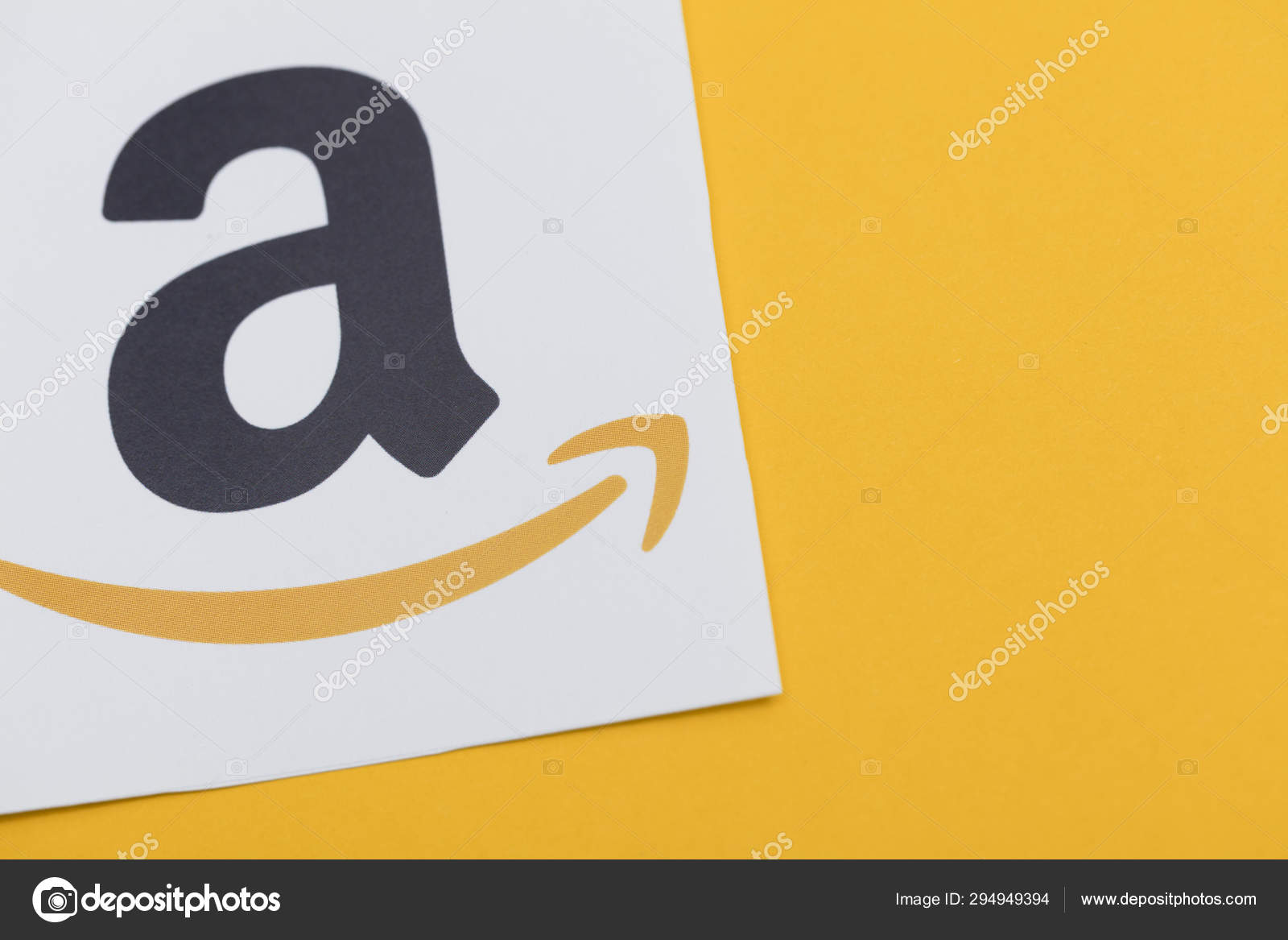 Amazon logo printed onto paper. Amazon is the largest online ret ...