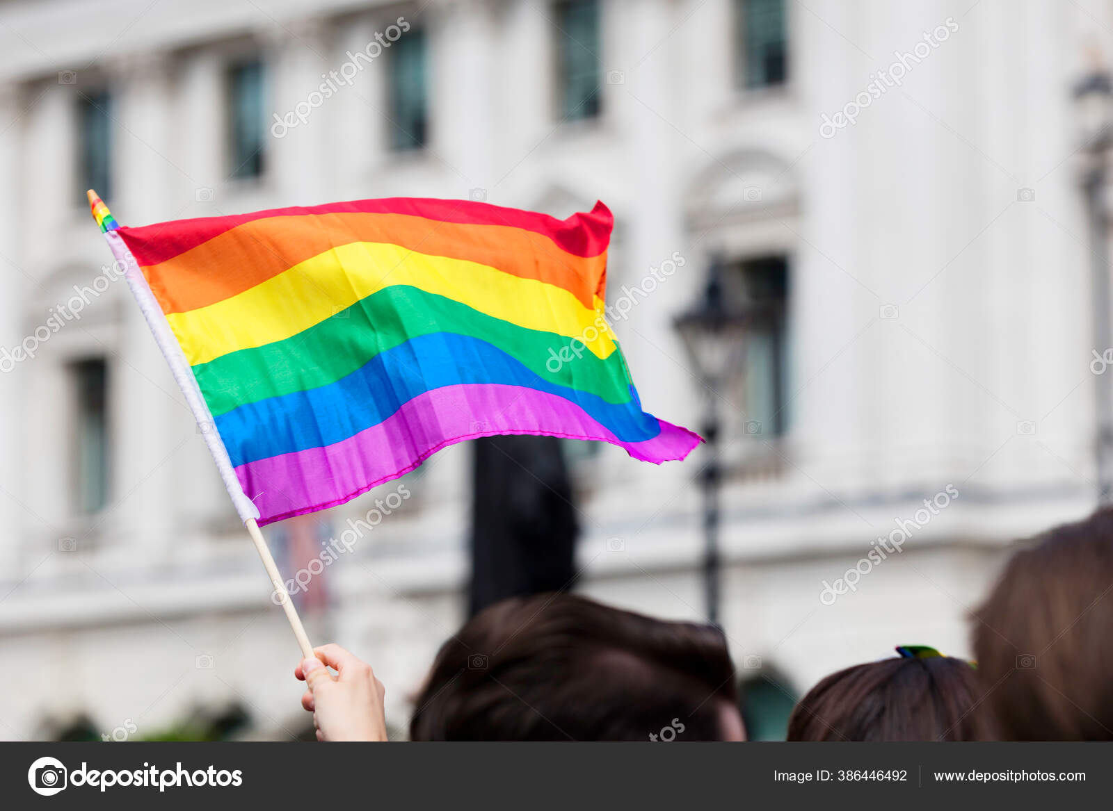 Gay Pride Lgbtq Rainbow Flags Being Waved In The Air At A Pride Event
