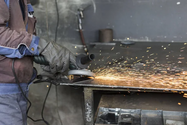 Grinding of materials in metallurgy workshop Stock Photo by ©MexChriss ...