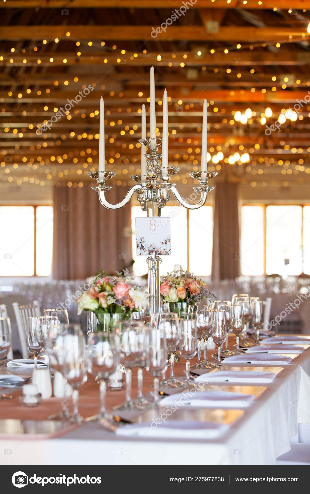 Decorative candles on table at wedding reception Stock Photo by ...