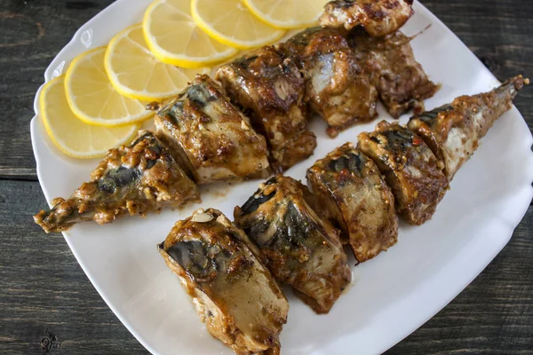 Skewered fish Stock Photos, Royalty Free Skewered fish Images ...