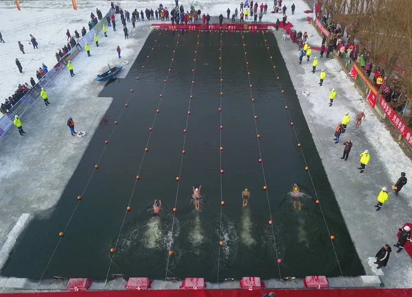 Chinese Contestants Jump Freezing Water Winter Swimming Competition ...