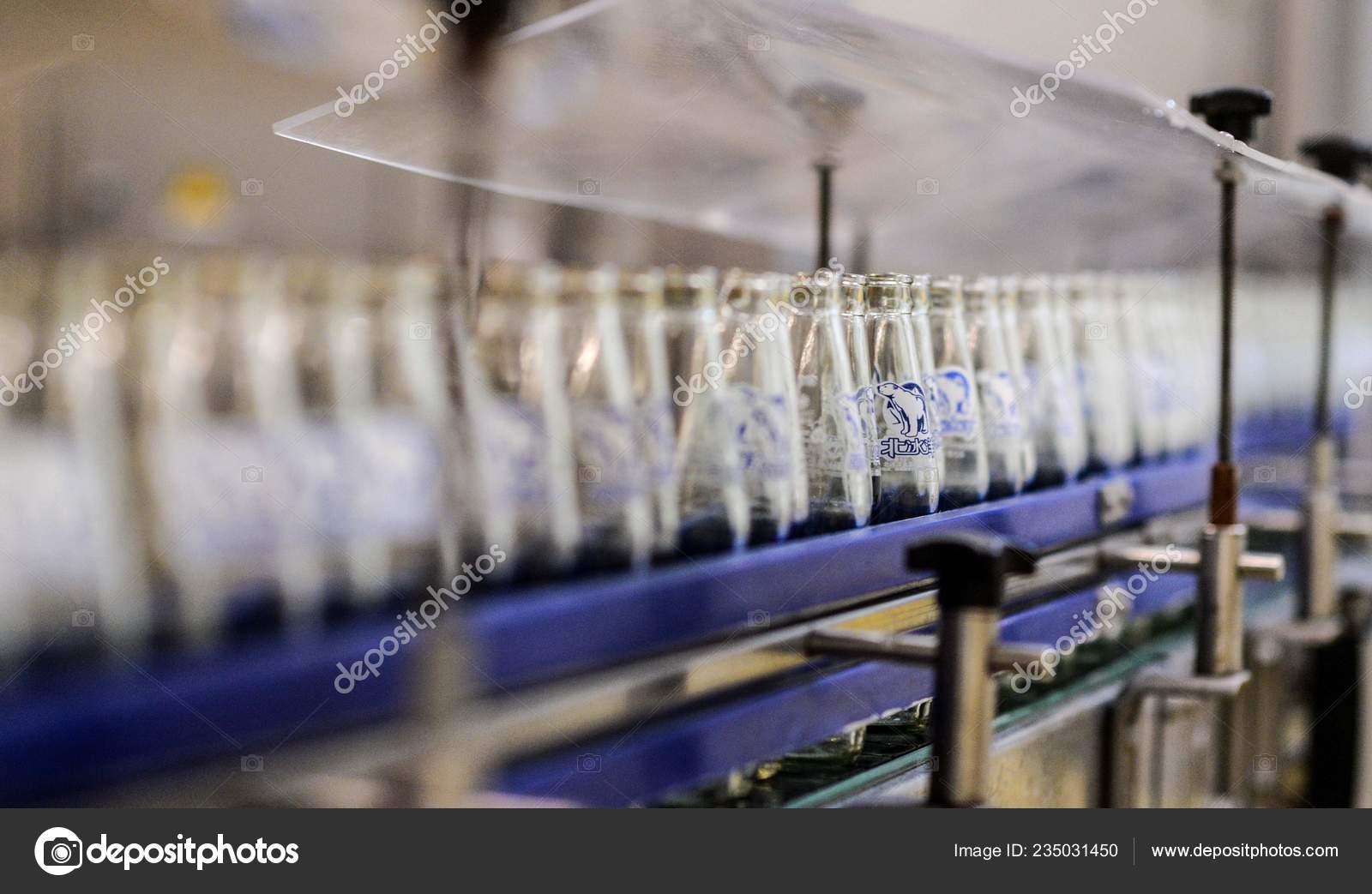 Bottles Filled Orange Soda Being Cleaned Disinfected Assembly Line ...