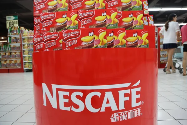 Nescafe logo Stock Photos, Royalty Free Nescafe logo Images | Depositphotos