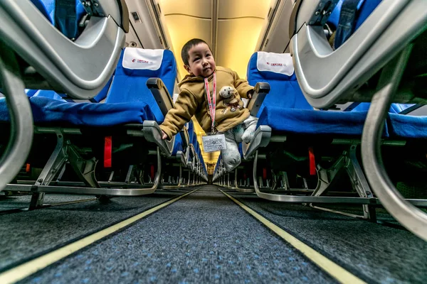 Baby in plane Stock Photos, Royalty Free Baby in plane Images ...