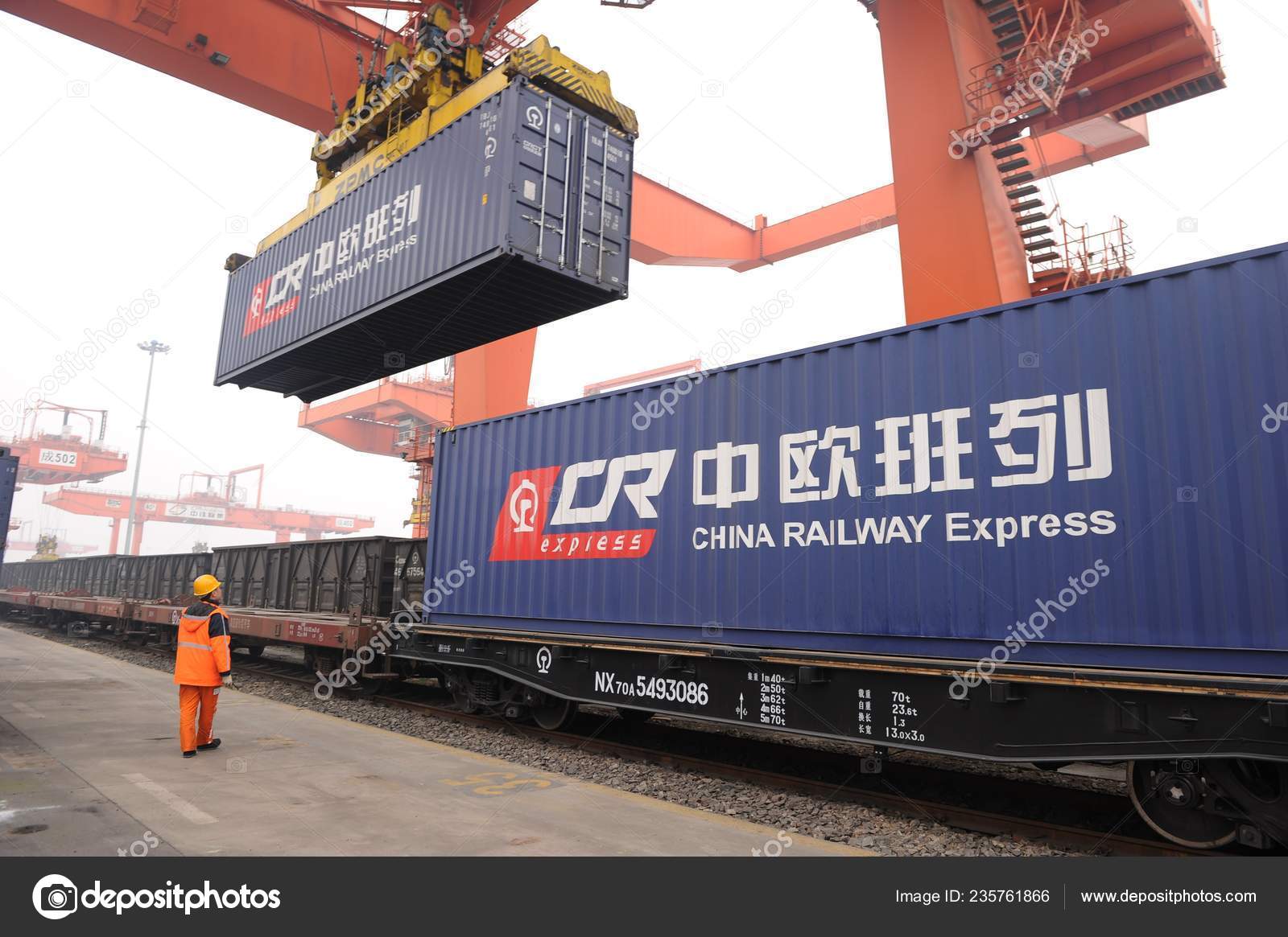 Chinese Worker Watches Container China Railway Express Being Loaded ...