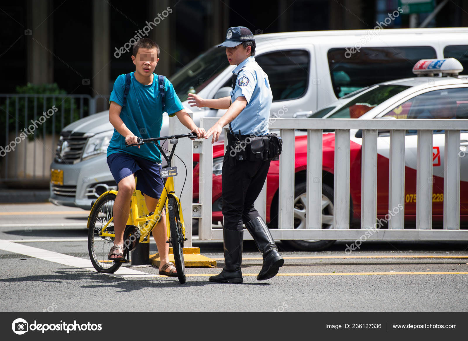 Police Officer Stops Cyclist Riding Bicycle Chinese Bike Sharing ...