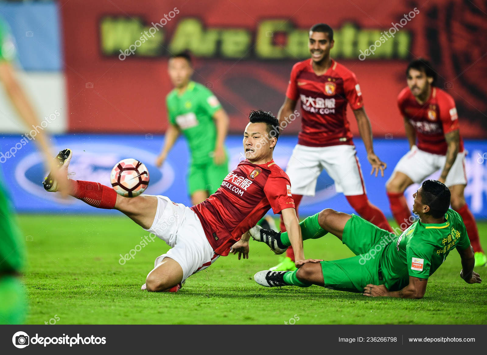 Gao Lin Guangzhou Evergrande Front Left Challenges Burak Yilmaz Beijing ...