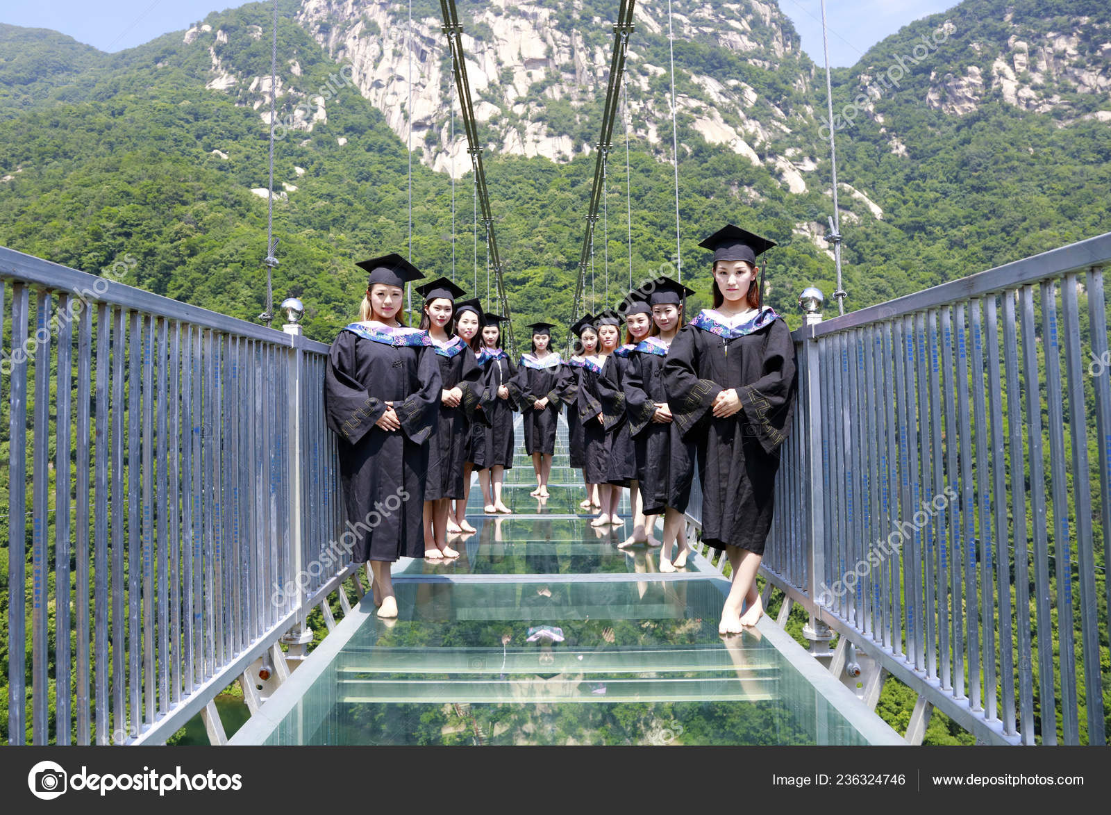 Female Graduates Dressed Academic Gowns Pose Graduation Photos Glass ...
