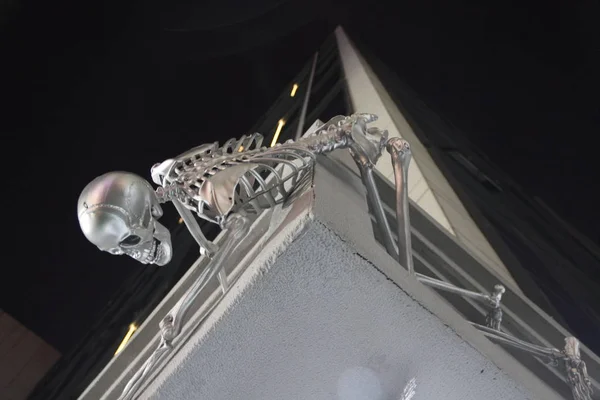 Skeleton Sculptures Climb Shopping Mall Attract Customers Ji'nan City ...