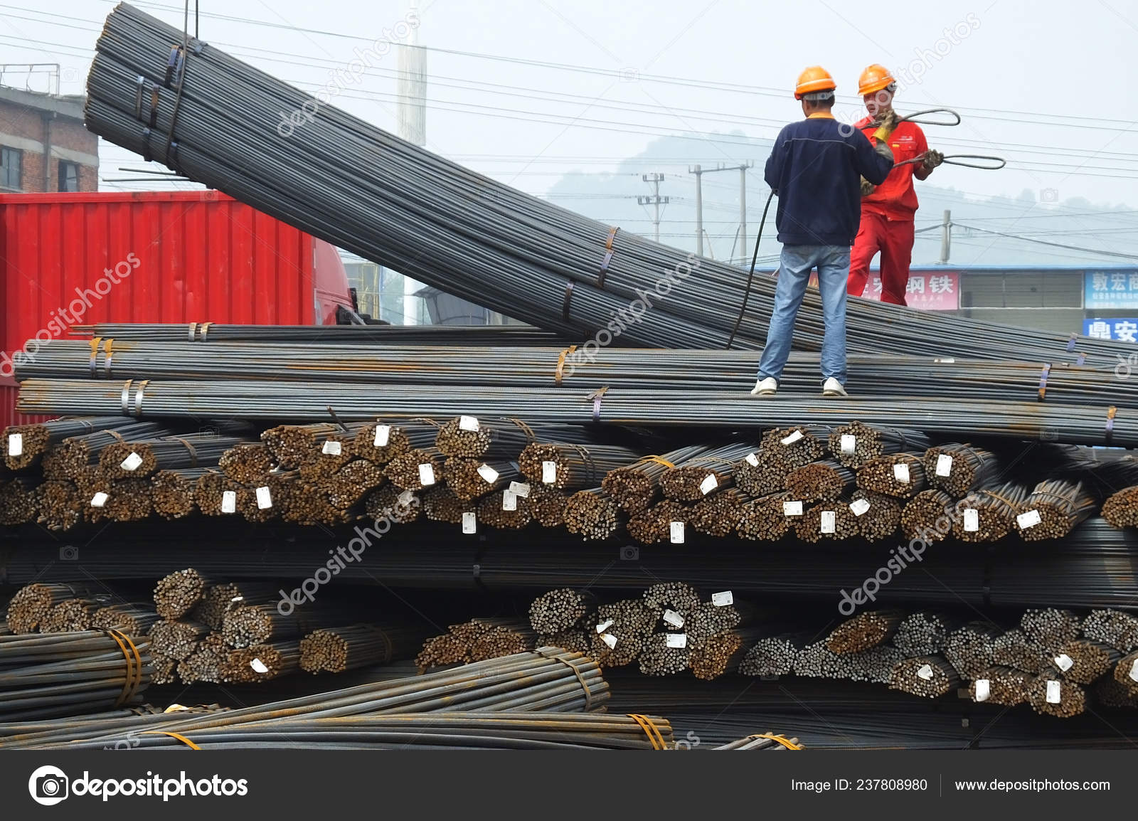 Chinese Workers Direct Crane Lift Reinforcing Steel Rods Exported Steel ...
